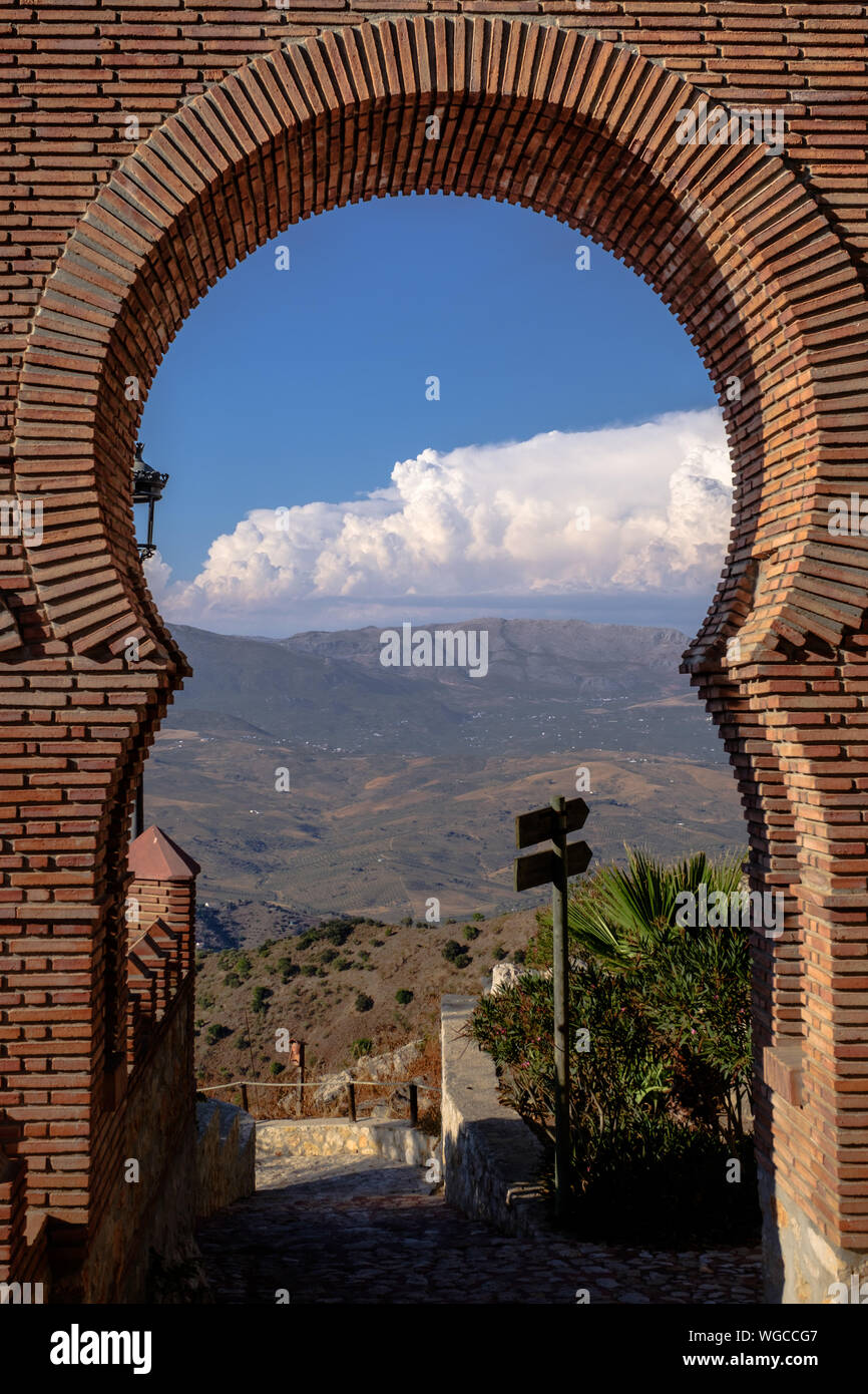 Moorish arch in the mountain top village of Comares, Axarquia ...