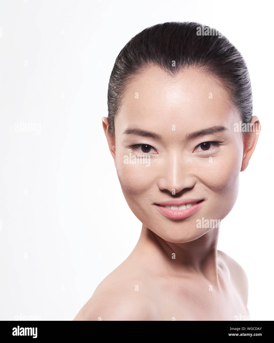 Asian beauty. Young woman isolated on white Stock Photo - Alamy