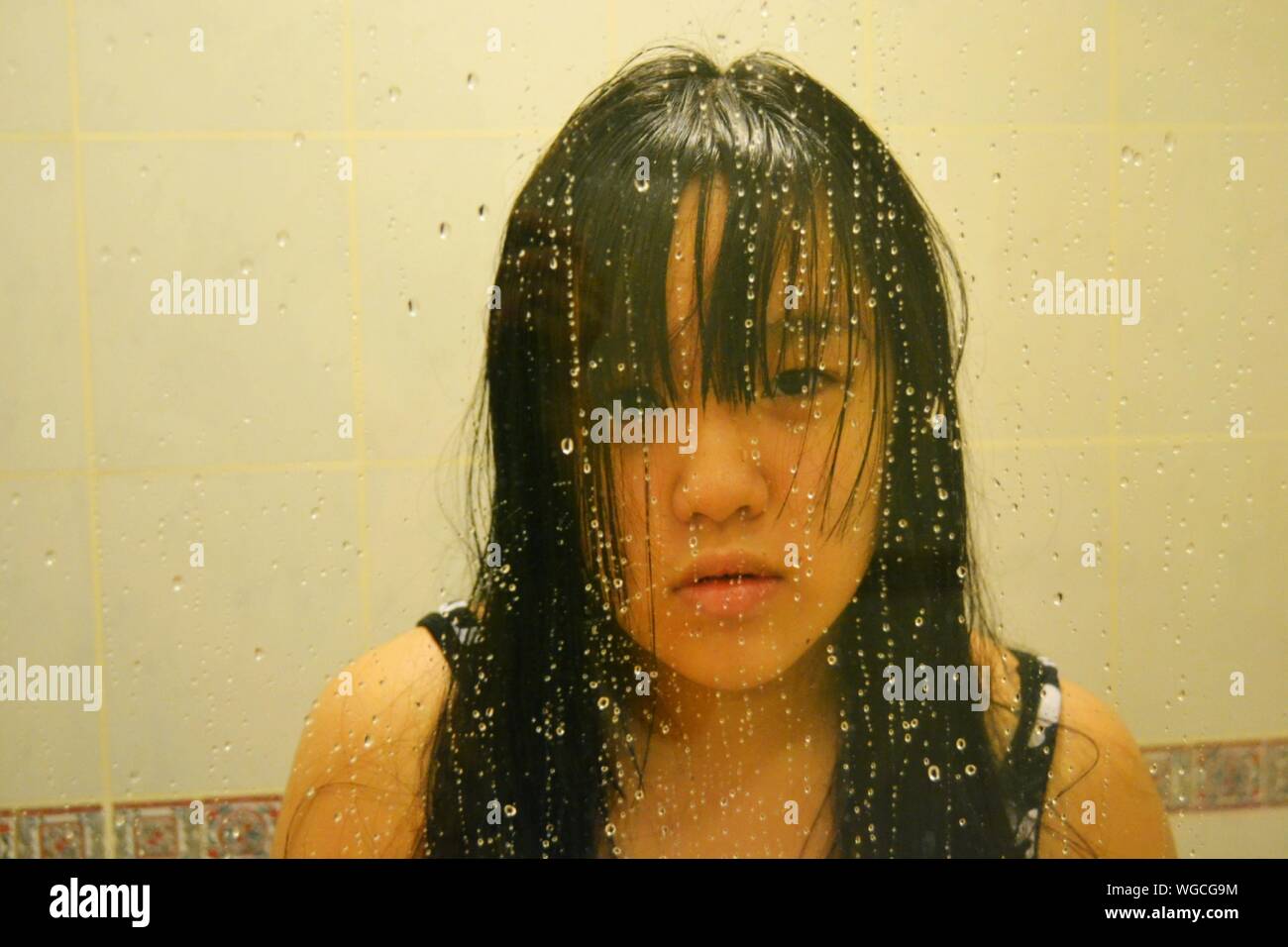 Woman young taking shower hi-res stock photography and images - Alamy