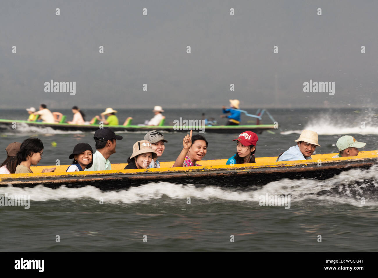 Inle, Myanmar - April 2019: Burmese people having boat ride on Inle ...