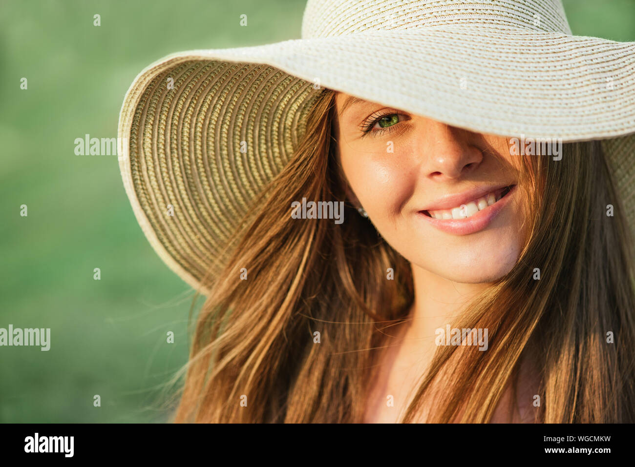 Hat Over Face Sun High Resolution Stock Photography and Images - Alamy