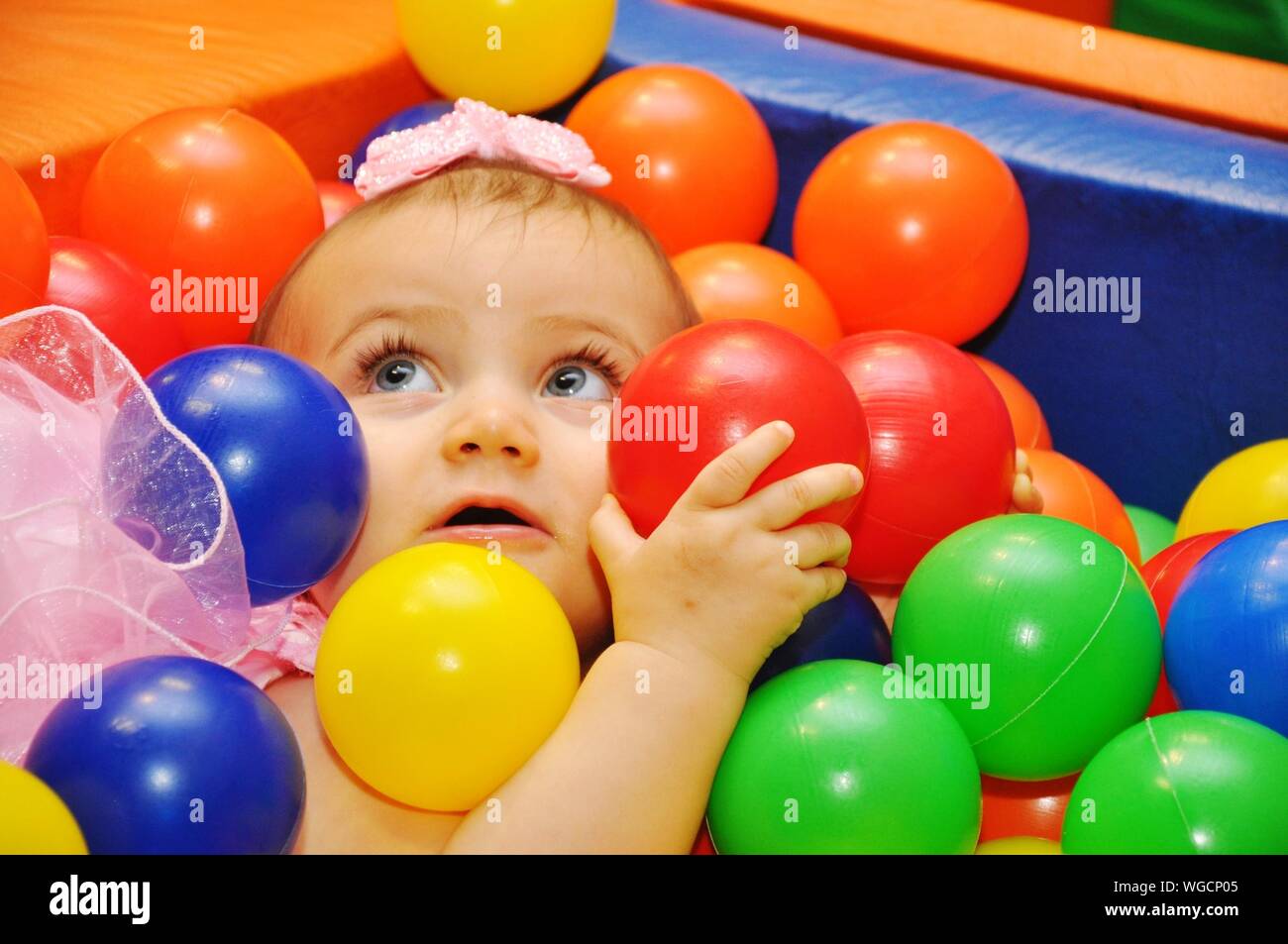 Baby girl balls hi-res stock photography and images - Alamy