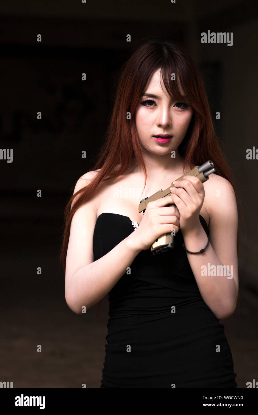 Woman Loading Gun High Resolution Stock Photography and Images - Alamy