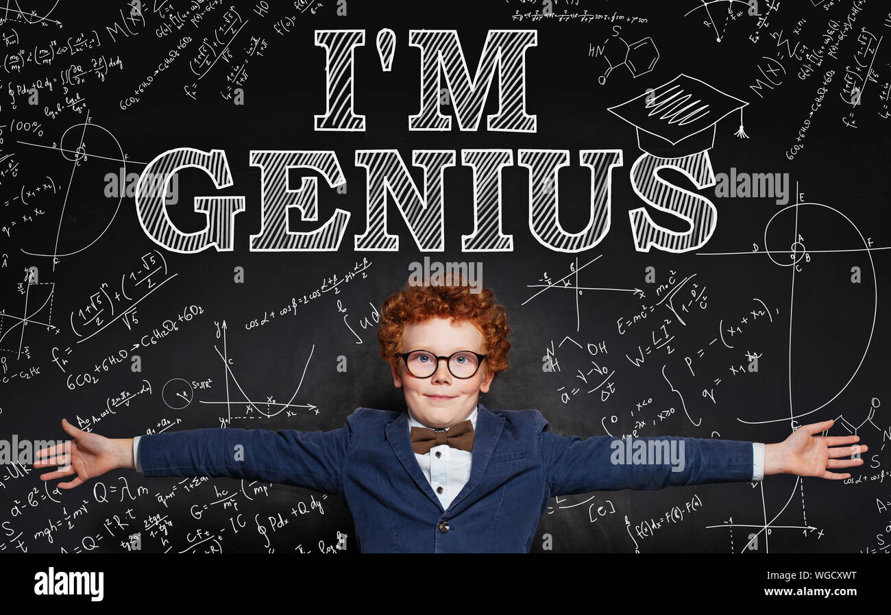 Curious genius child in glasses on blackboard background portrait Stock ...