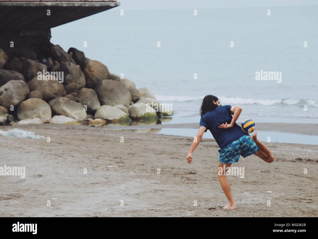 Man beach ball hi-res stock photography and images - Alamy