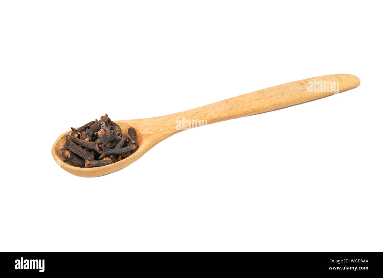 Wooden spoon with dry cloves isolated on white background Stock Photo ...