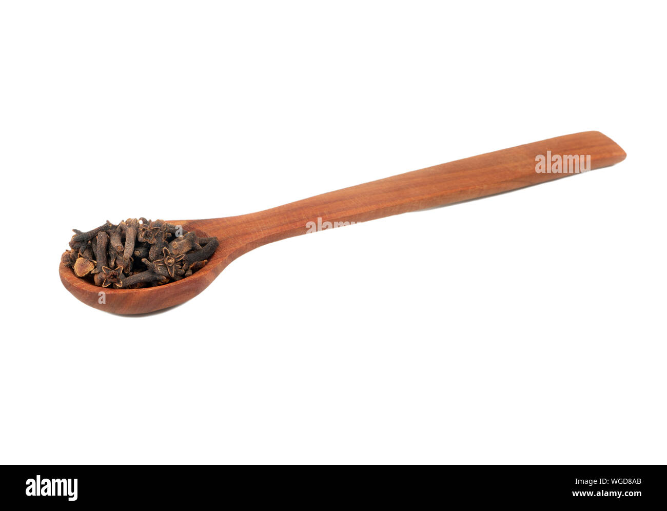 Dry cloves in wooden spoon isolated on white background Stock Photo - Alamy