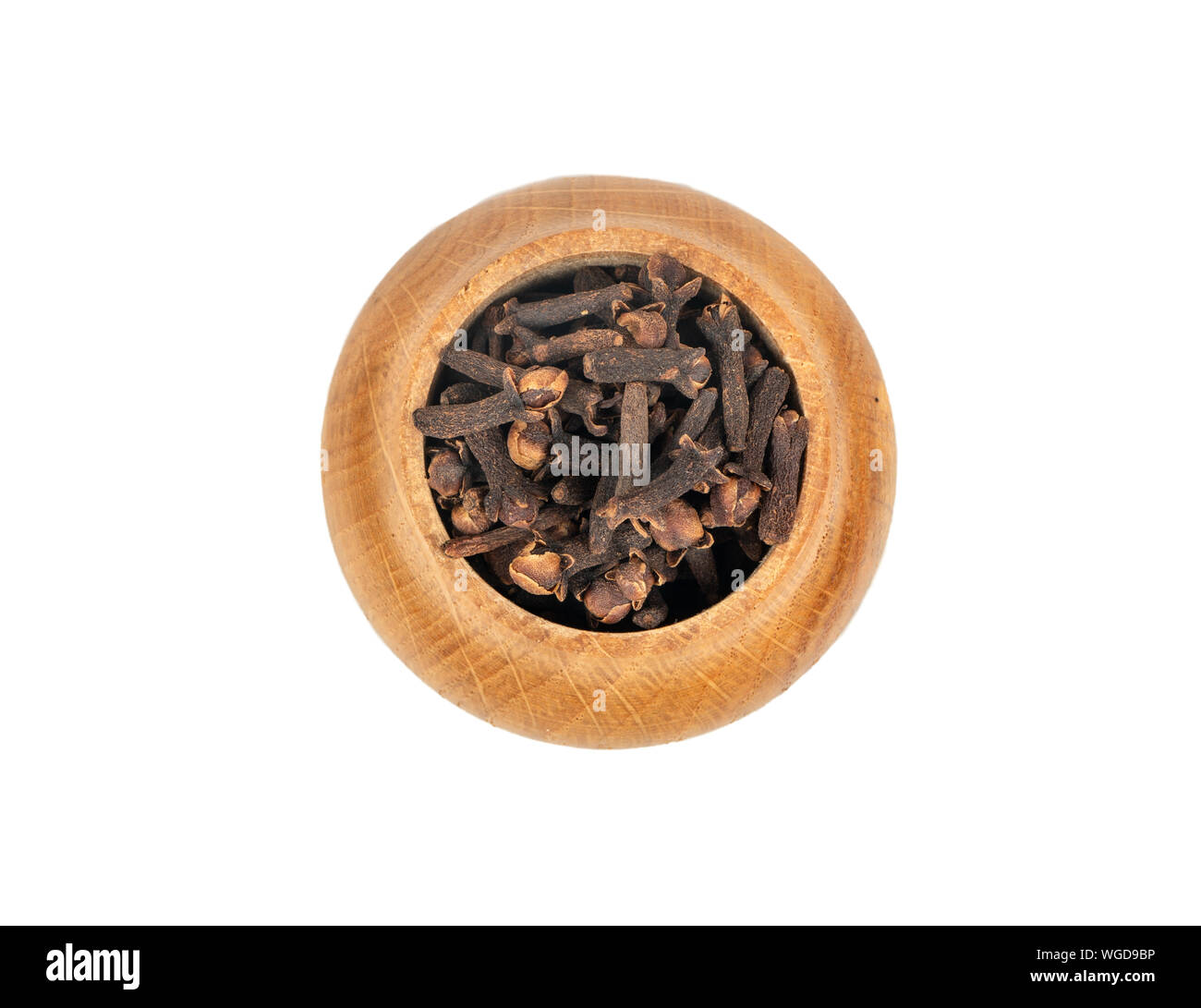 Spice dry cloves in wooden container isolated on white background, top ...