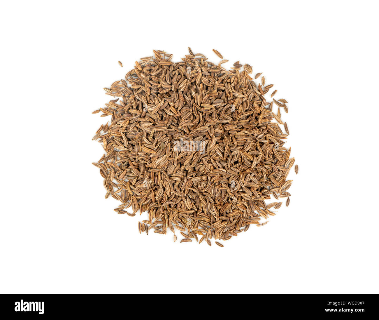 Bunch of dry cumin isolated on white background, top view Stock Photo ...