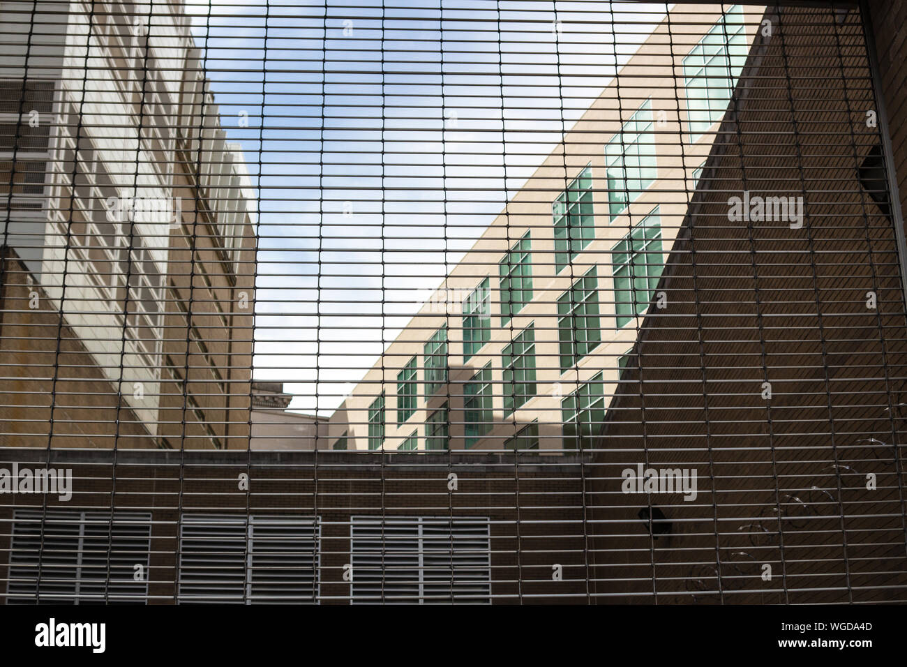 The security barrier in front of the county jail creates a precise ...