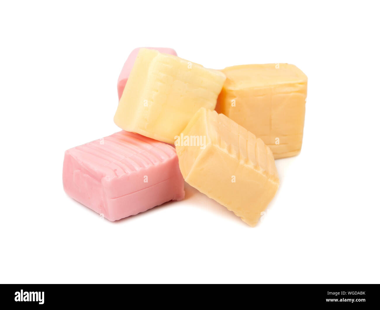 Bunch of square chewing candies on a white background Stock Photo - Alamy