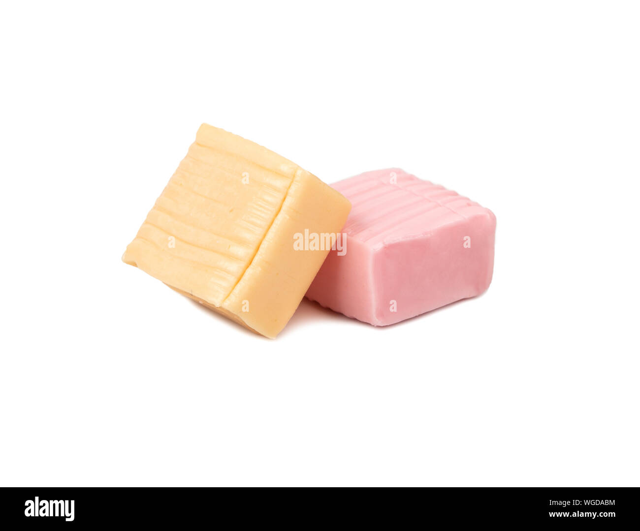 Two square chewy candies on white background Stock Photo - Alamy