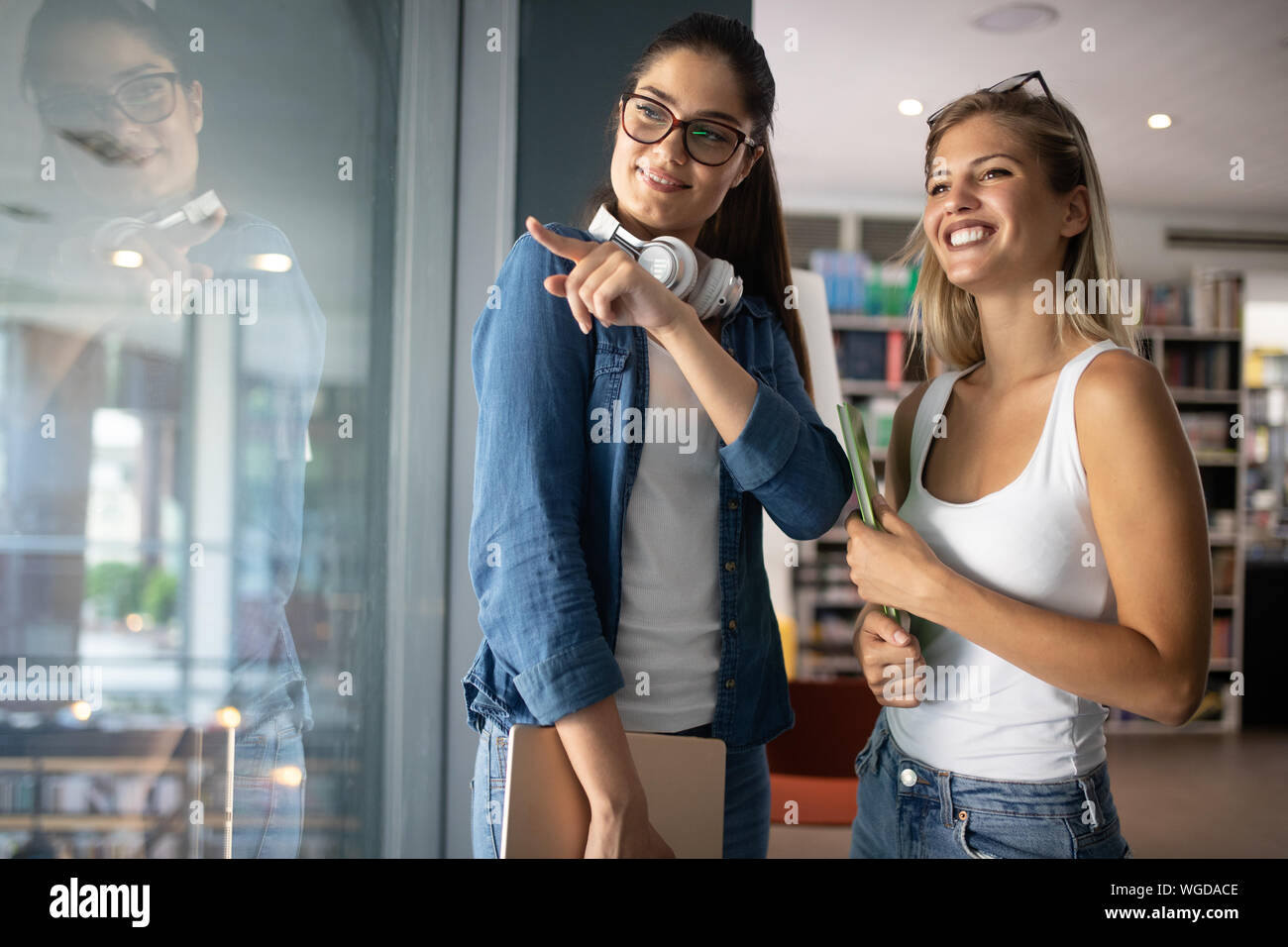 Group of young students are studying together in university Stock Photo ...