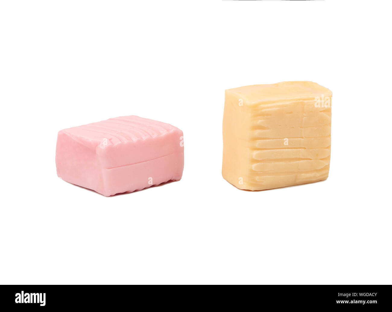 Two square chewy candies on white background Stock Photo - Alamy