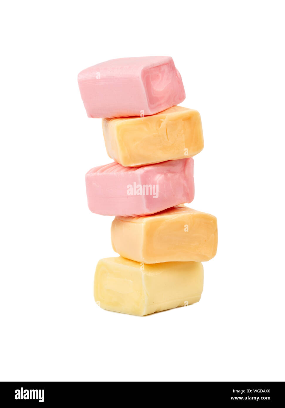 Stack of square chewing candies on a white background Stock Photo - Alamy