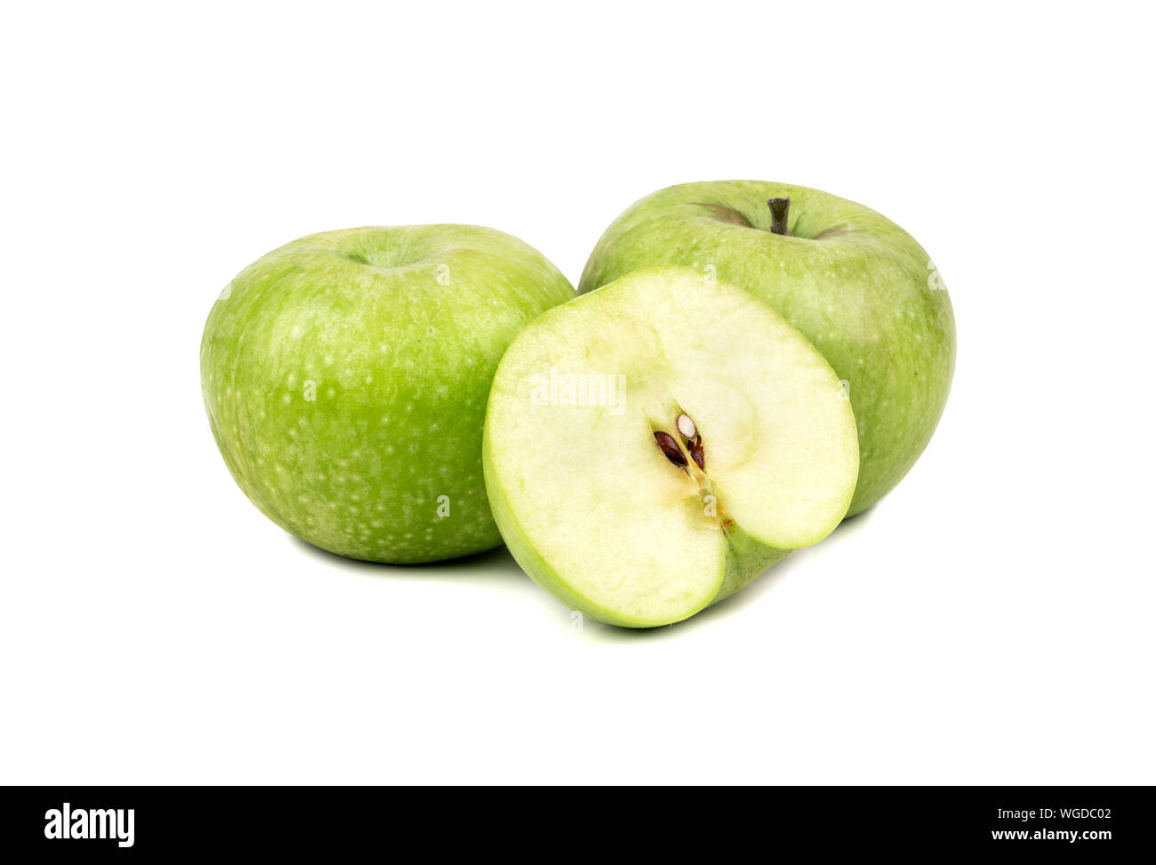 Two apple fruit with half on white background Stock Photo - Alamy