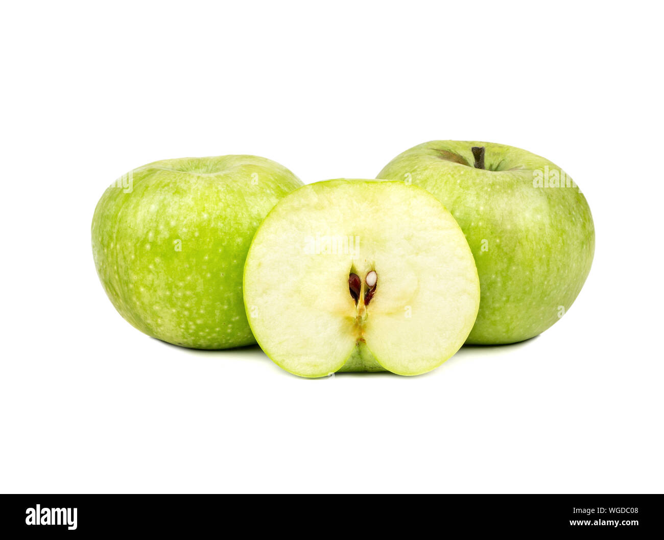 Two apple fruit with half on white background Stock Photo - Alamy