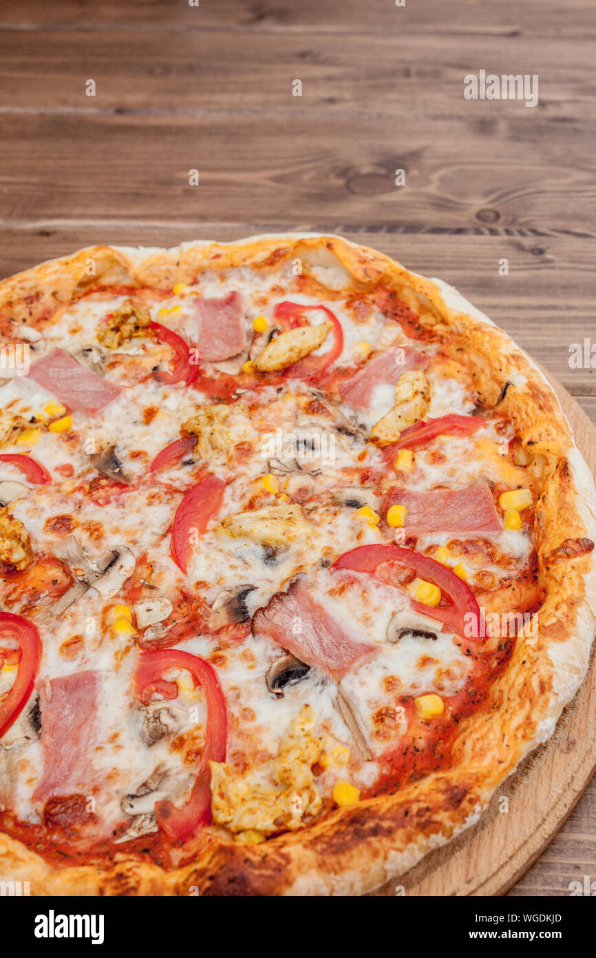 Pepperoni Pizza with Mozzarella cheese, Ham, Tomatoes, pepper, Spices ...