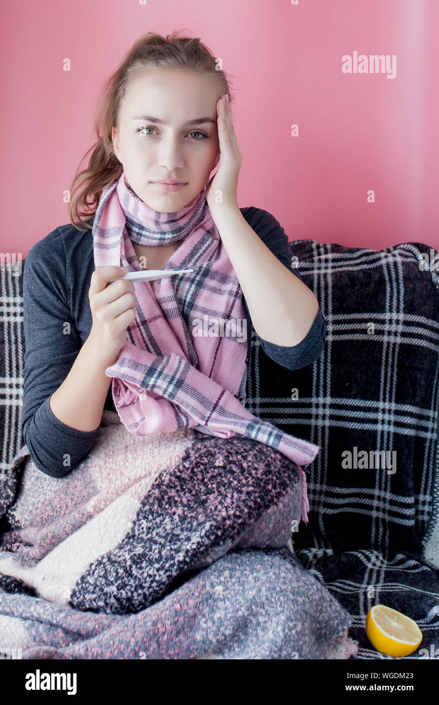 Flu cold grippe. Woman having high temperature. Sick girl with fever checking mercury ...