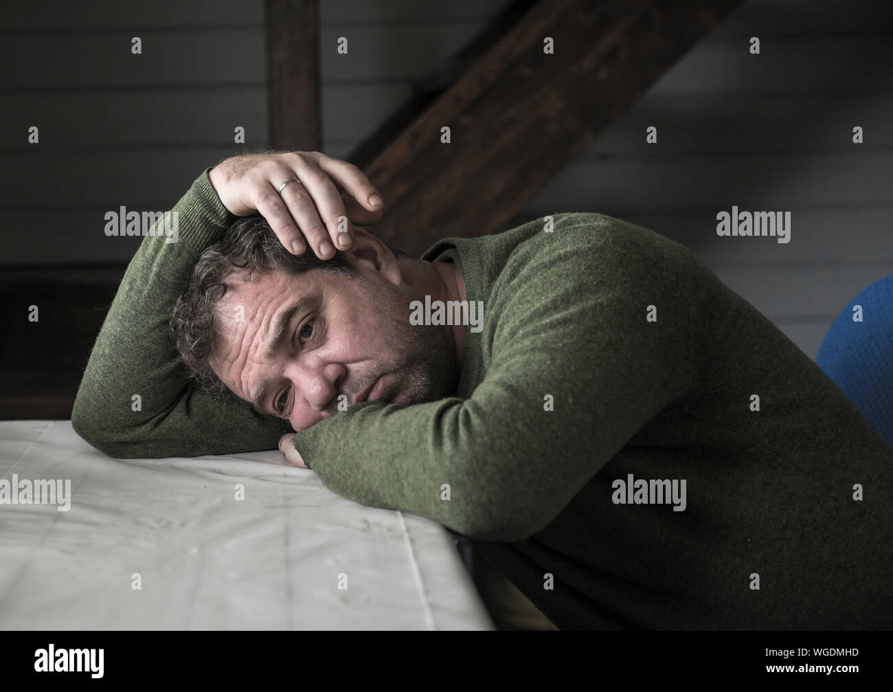 Man leaning on table hi-res stock photography and images - Alamy