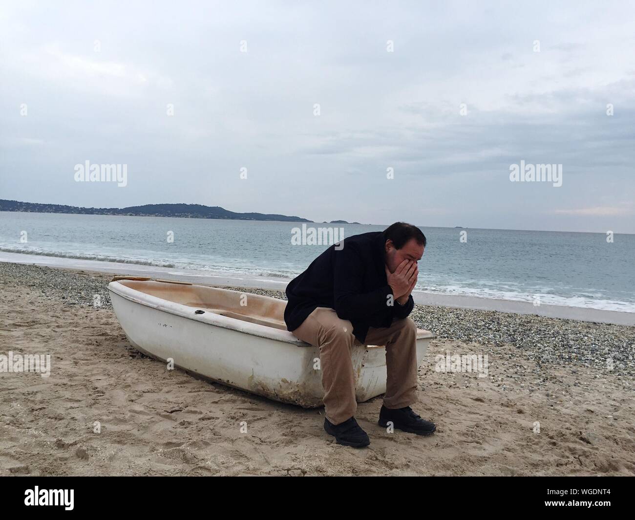Sad beach hi-res stock photography and images - Alamy