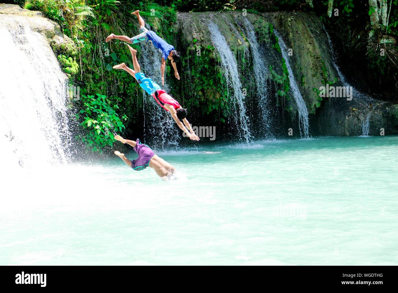 Men jumping swimming pool hi-res stock photography and images - Alamy