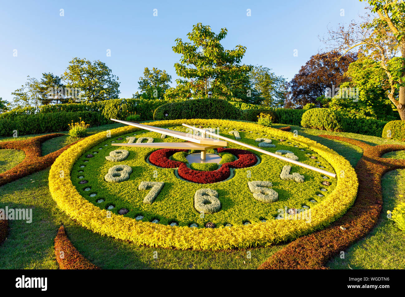 Outdoor flower clock designed in 1955, made with colorful flower blooms ...