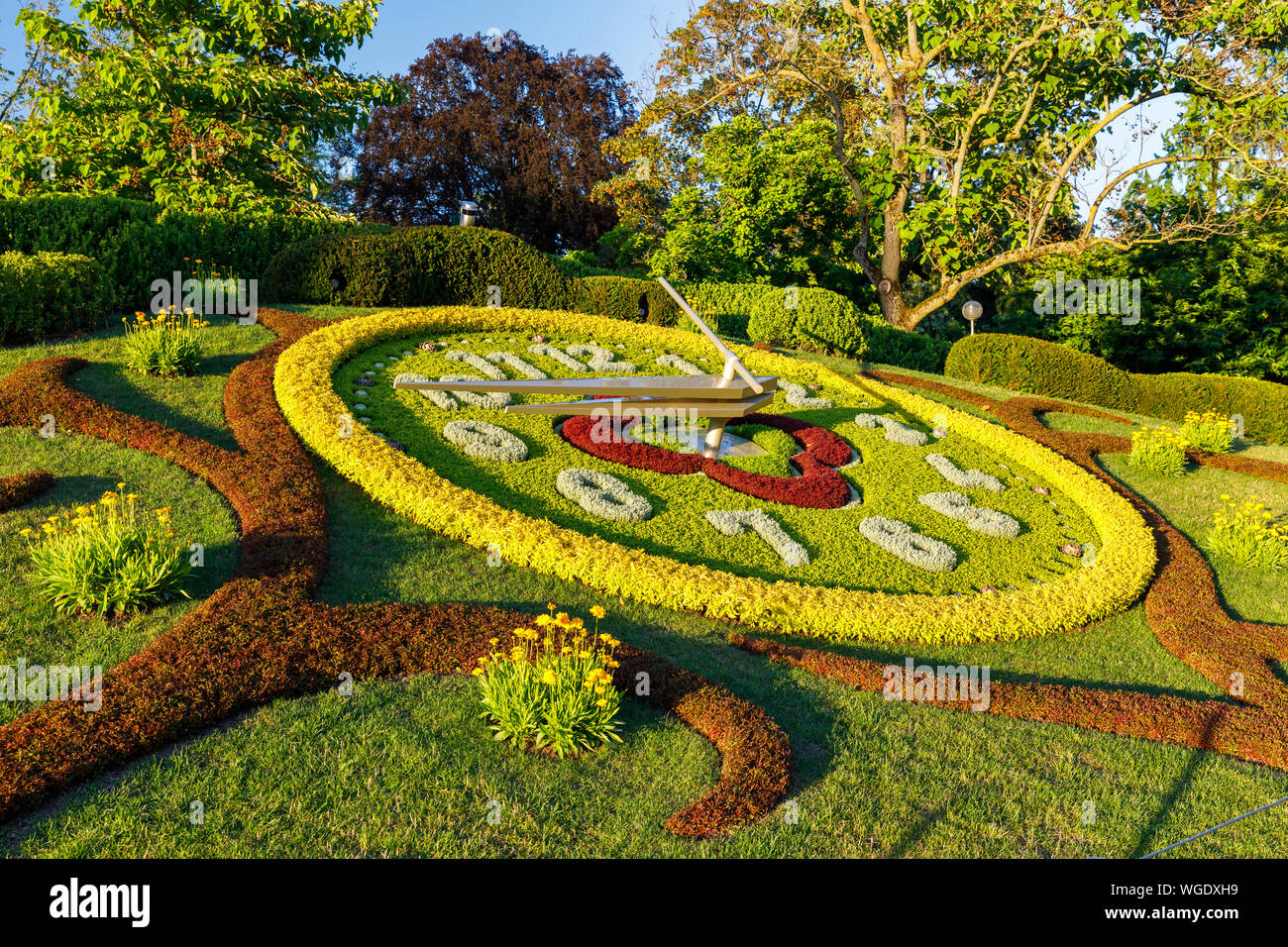 Outdoor flower clock designed in 1955, made with colorful flower blooms ...