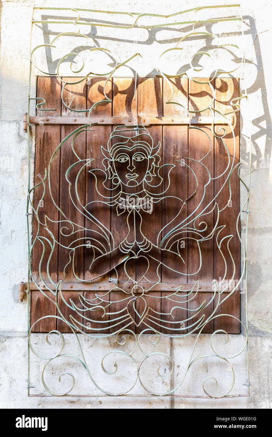 Large metal window grid in front of window hatch Stock Photo - Alamy