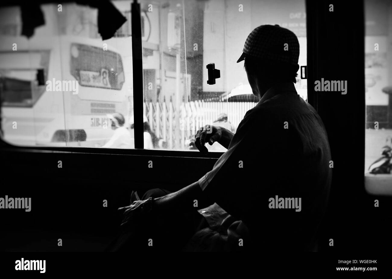 Man bus looking out of window hi-res stock photography and images - Alamy