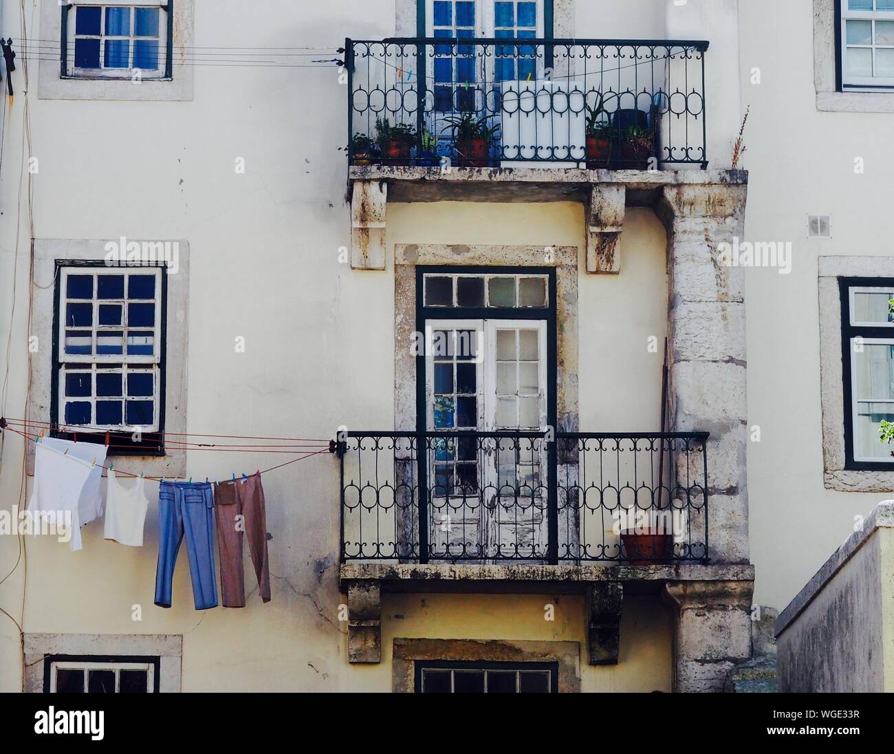 Clothes Drying On Apartment Balcony High Resolution Stock Photography ...