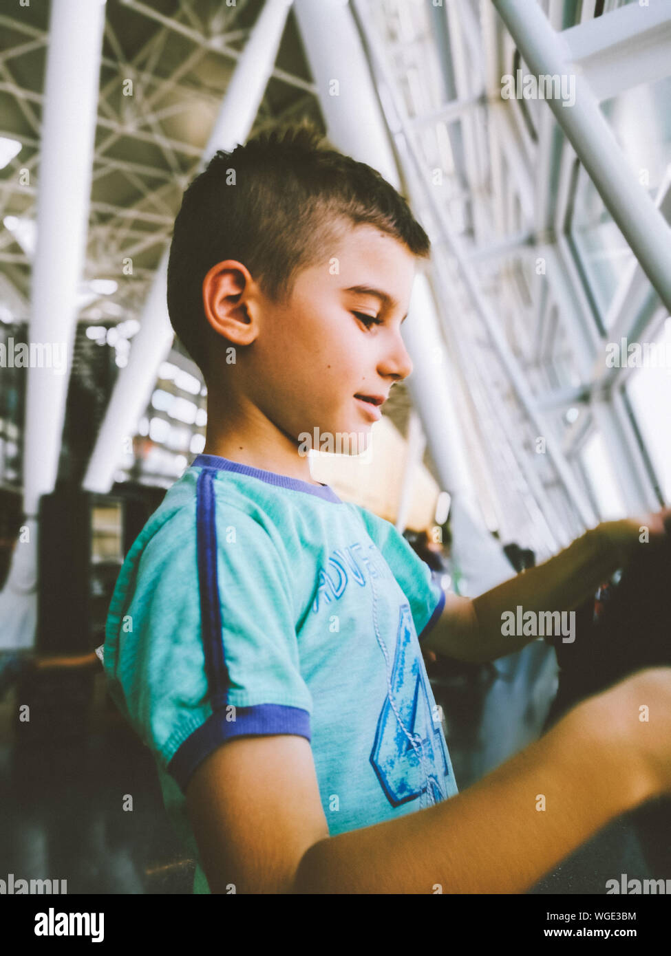 Boy looking down hi-res stock photography and images - Alamy