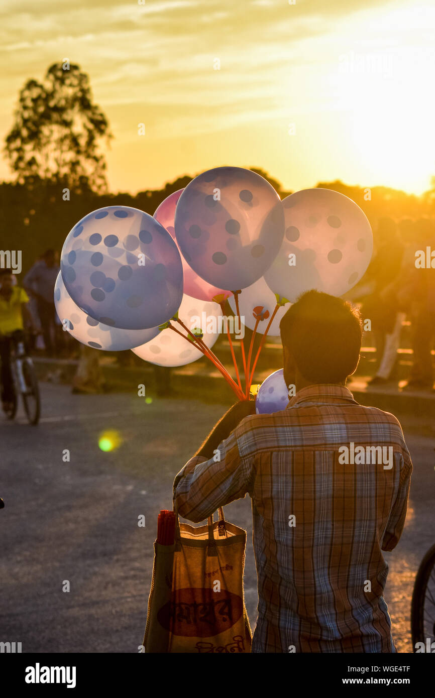 Man selling balloons hi-res stock photography and images - Alamy