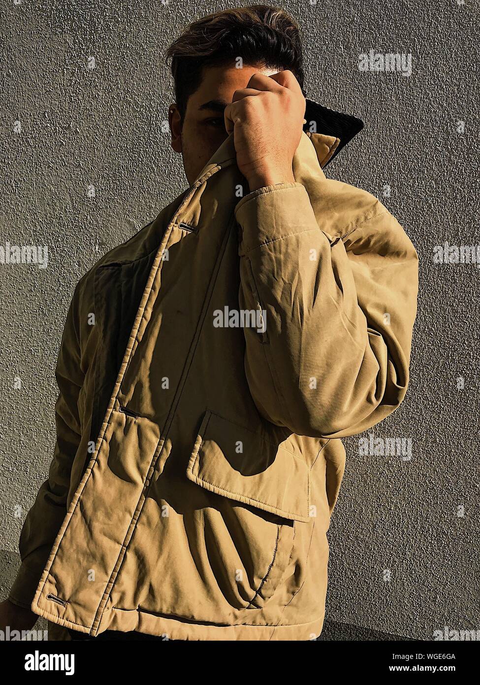 Covering face sun hi-res stock photography and images - Alamy