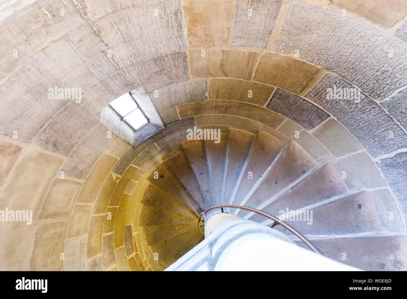 Old stone made round staircase in an ancient church tower Stock Photo ...