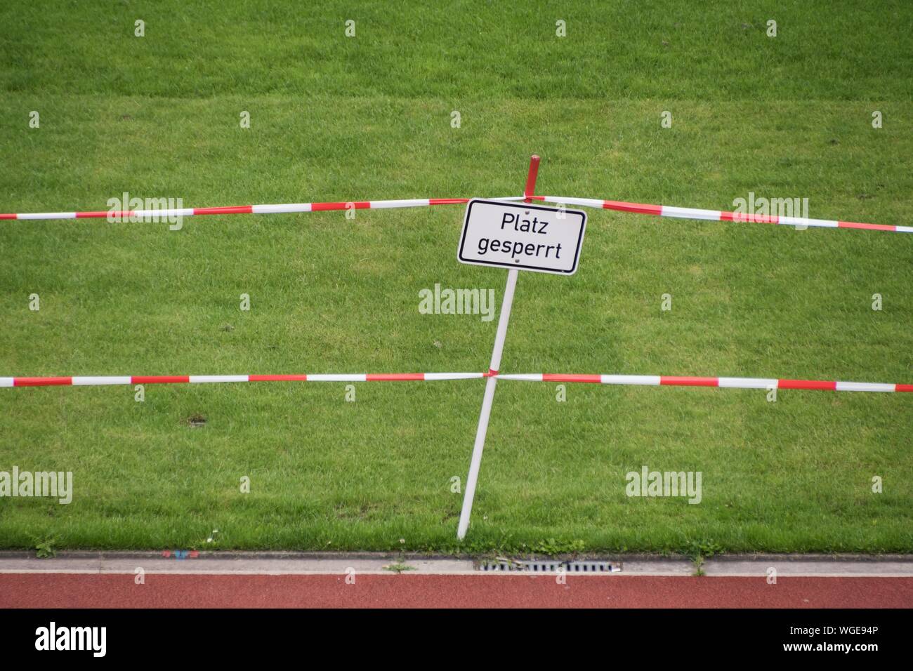 Text On Sign Board At Field Stock Photo - Alamy