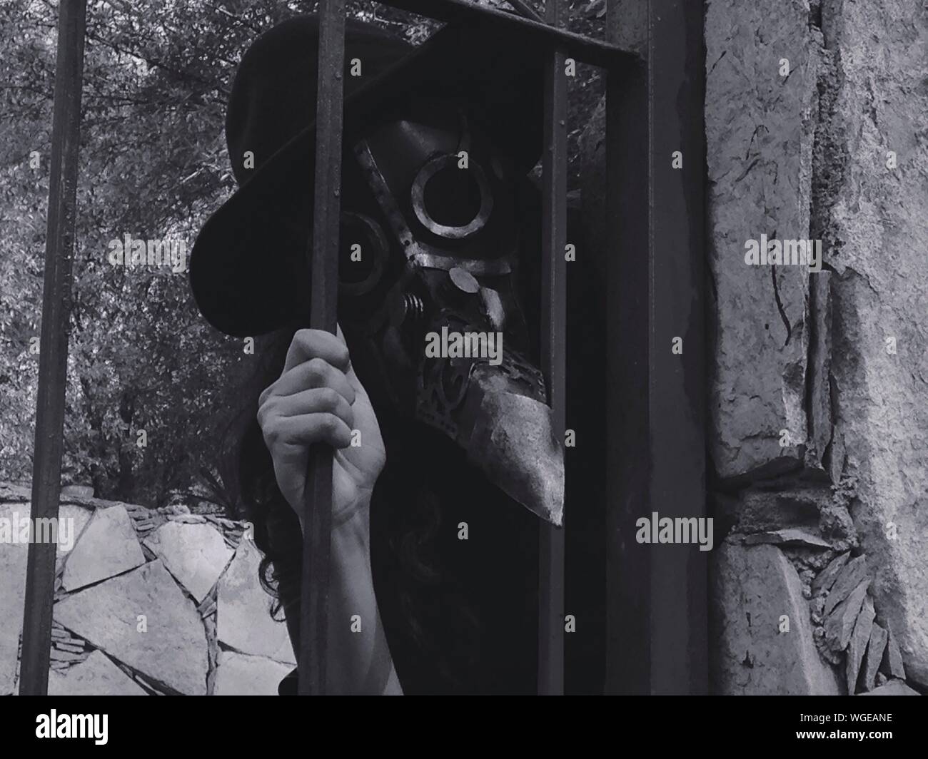 Person behind the mask hi-res stock photography and images - Alamy