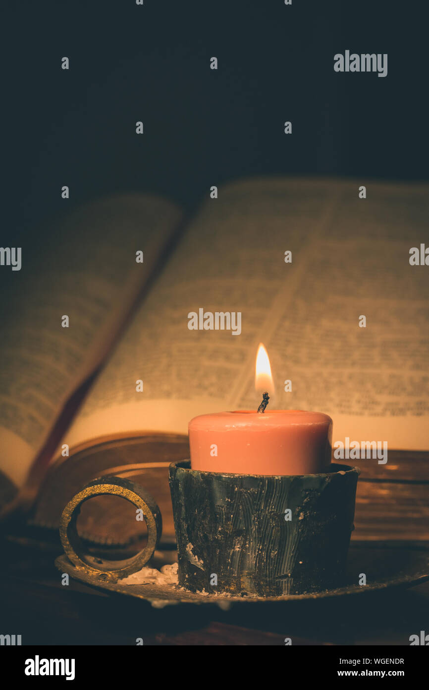 Open Bible And Candle High Resolution Stock Photography and Images - Alamy