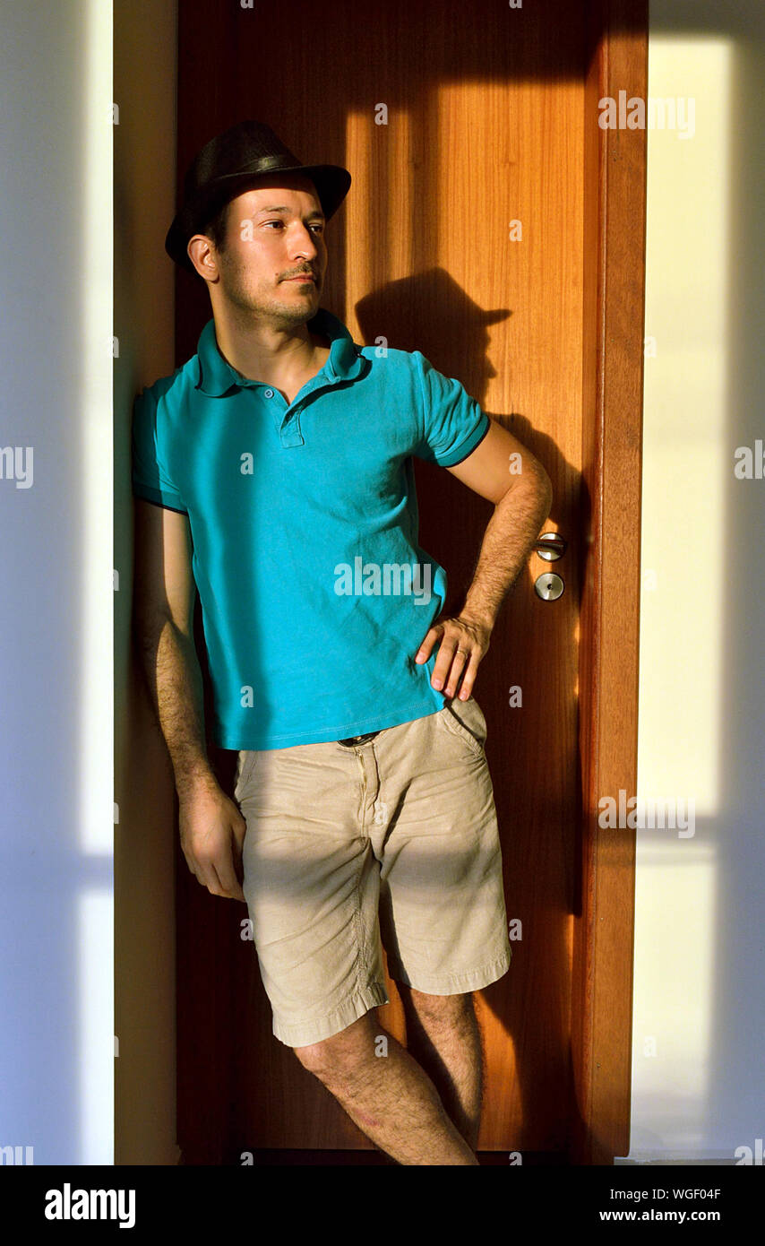 Man leaning against door hi-res stock photography and images - Alamy