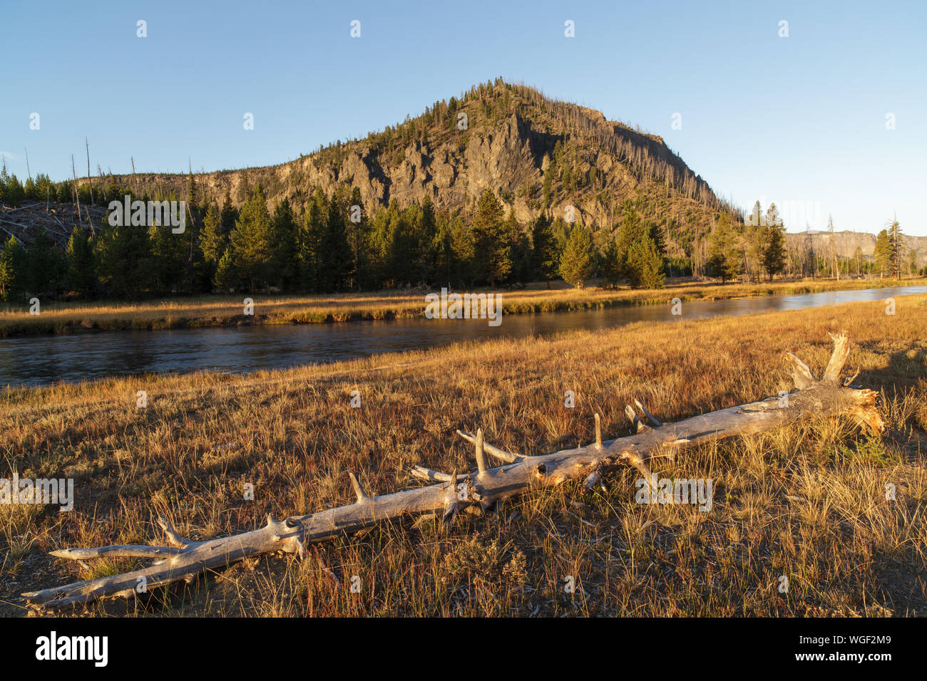 The morning sun lights the eastern side of National Park Mountain in ...