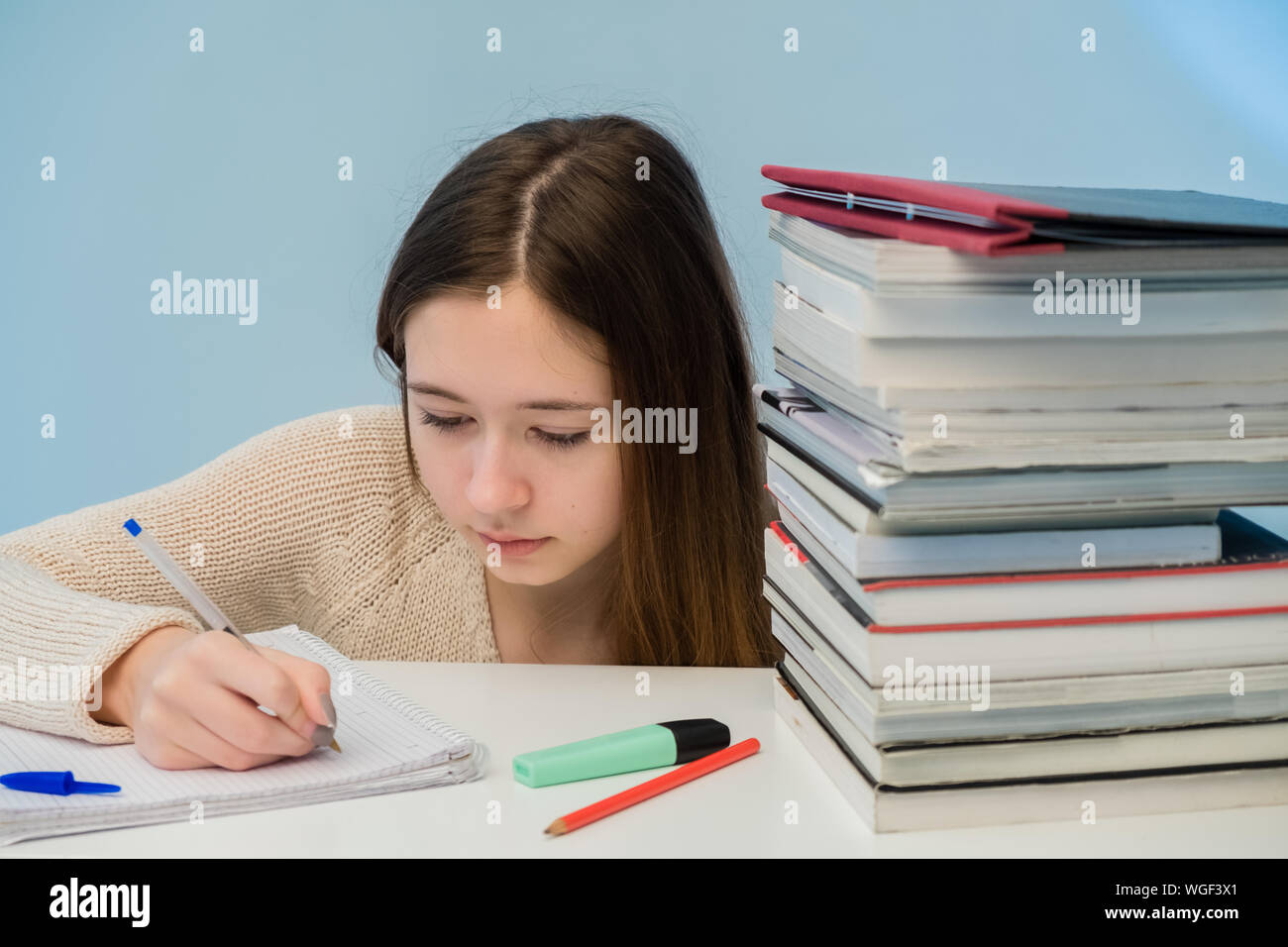 Teenage girl writing hi-res stock photography and images - Alamy
