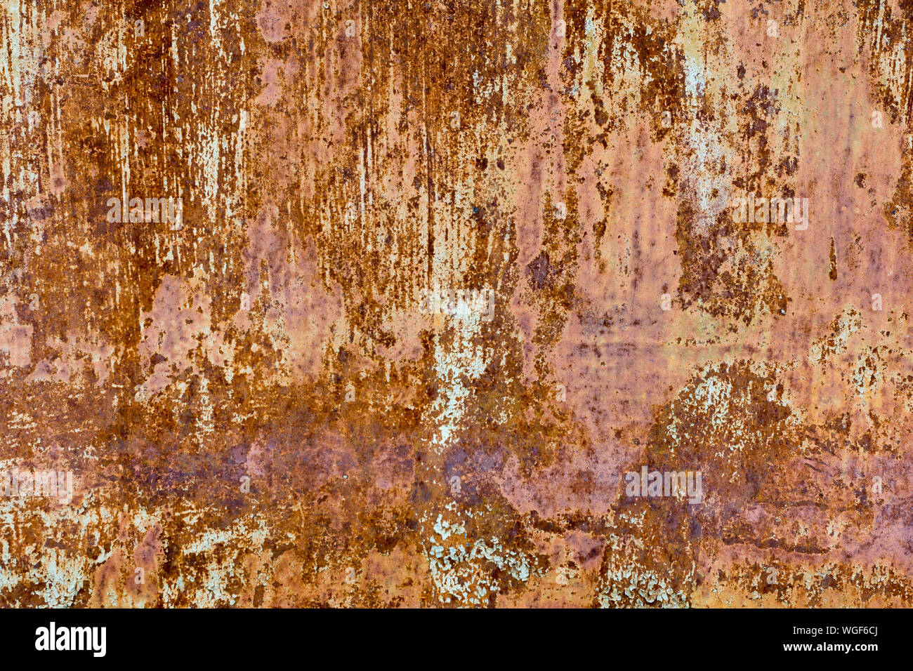 Rust, rusty background, rusty metal texture with paint residue and ...