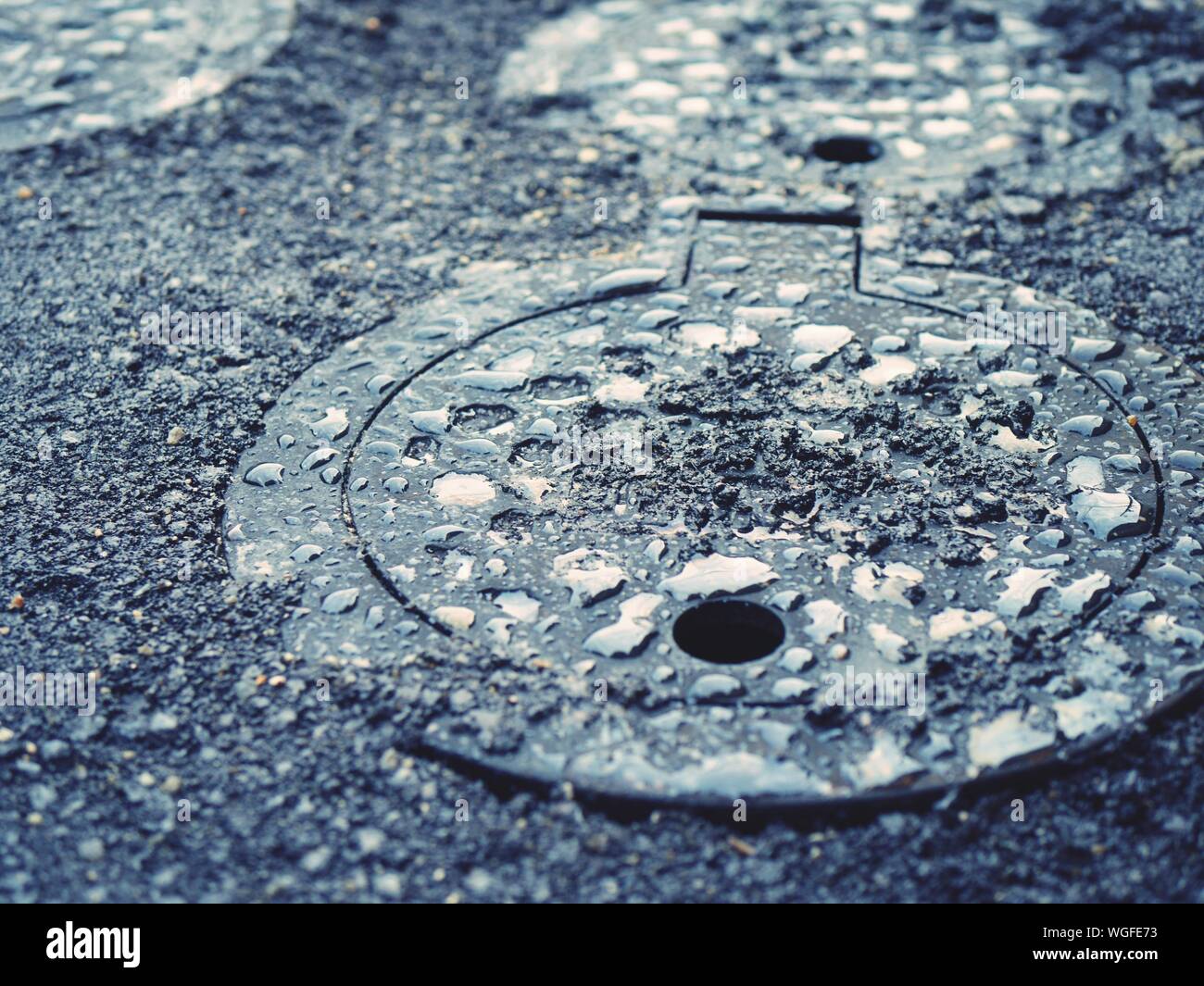 Wet manhole High Resolution Stock Photography and Images - Alamy