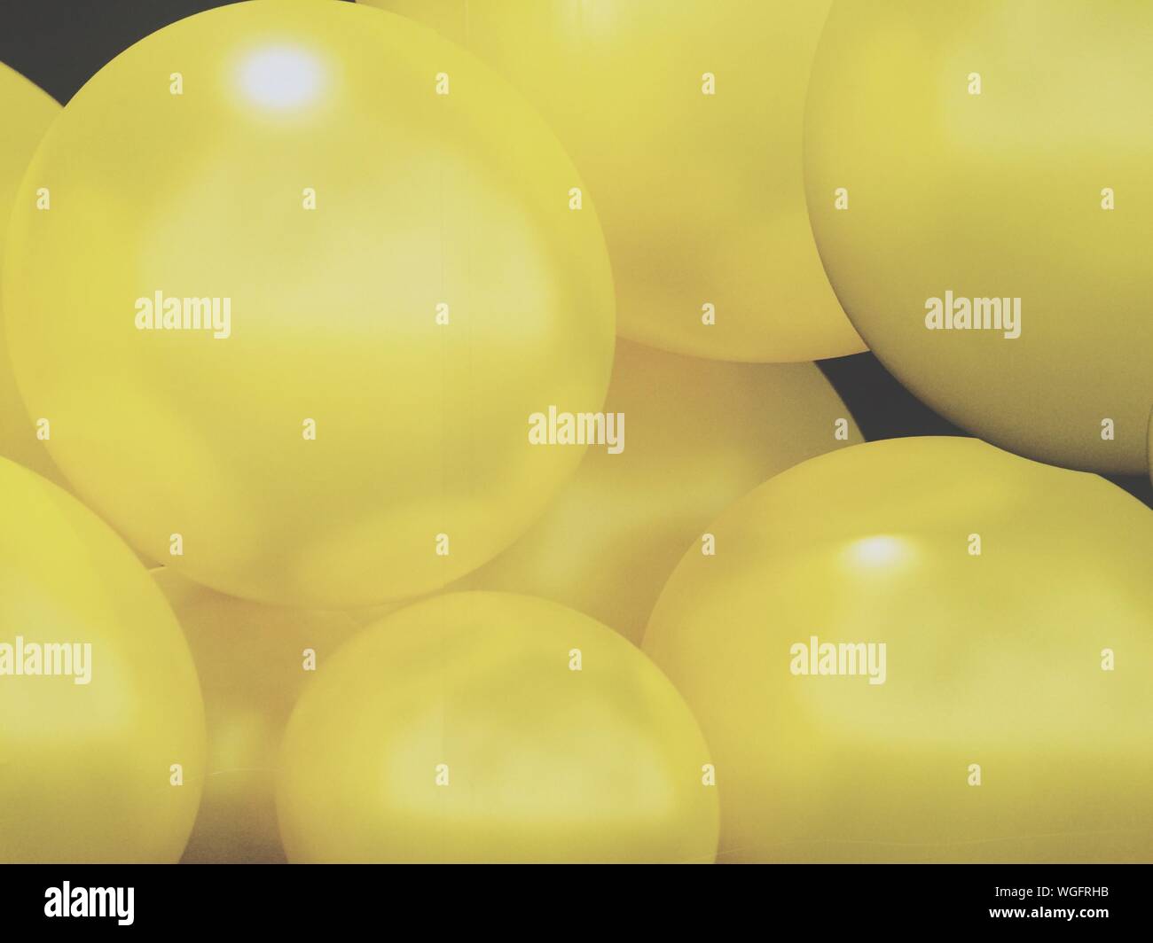 Yellow balloons hi-res stock photography and images - Alamy