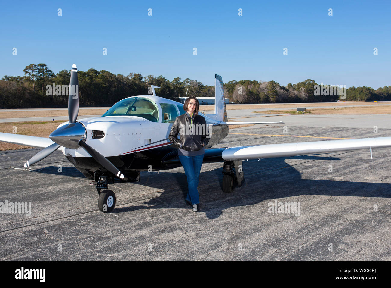female pilot with private plane Stock Photo - Alamy