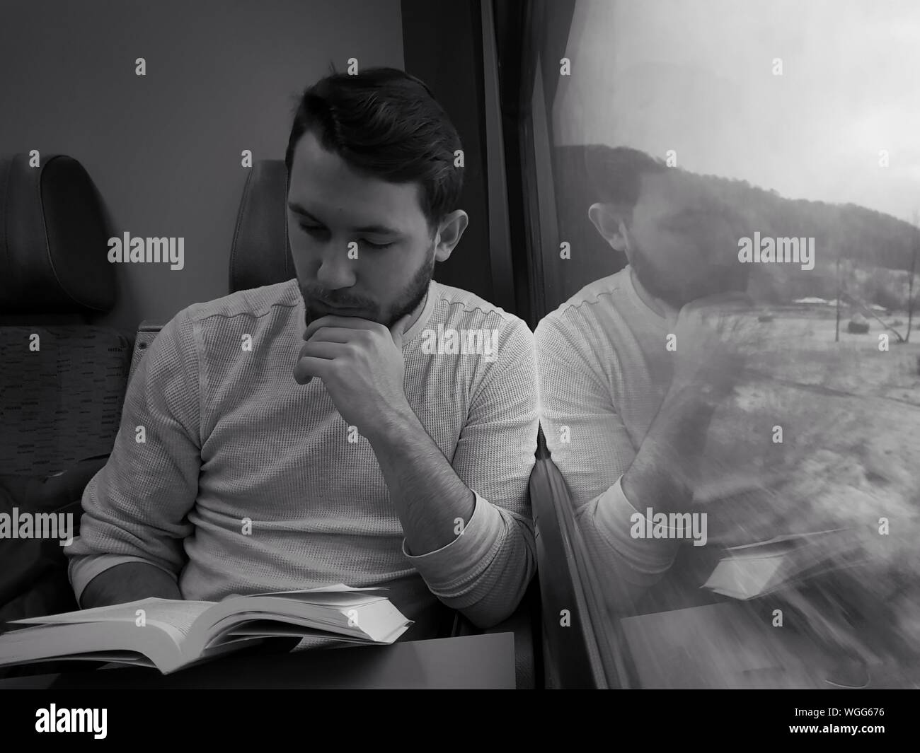 Train reading book hi-res stock photography and images - Alamy