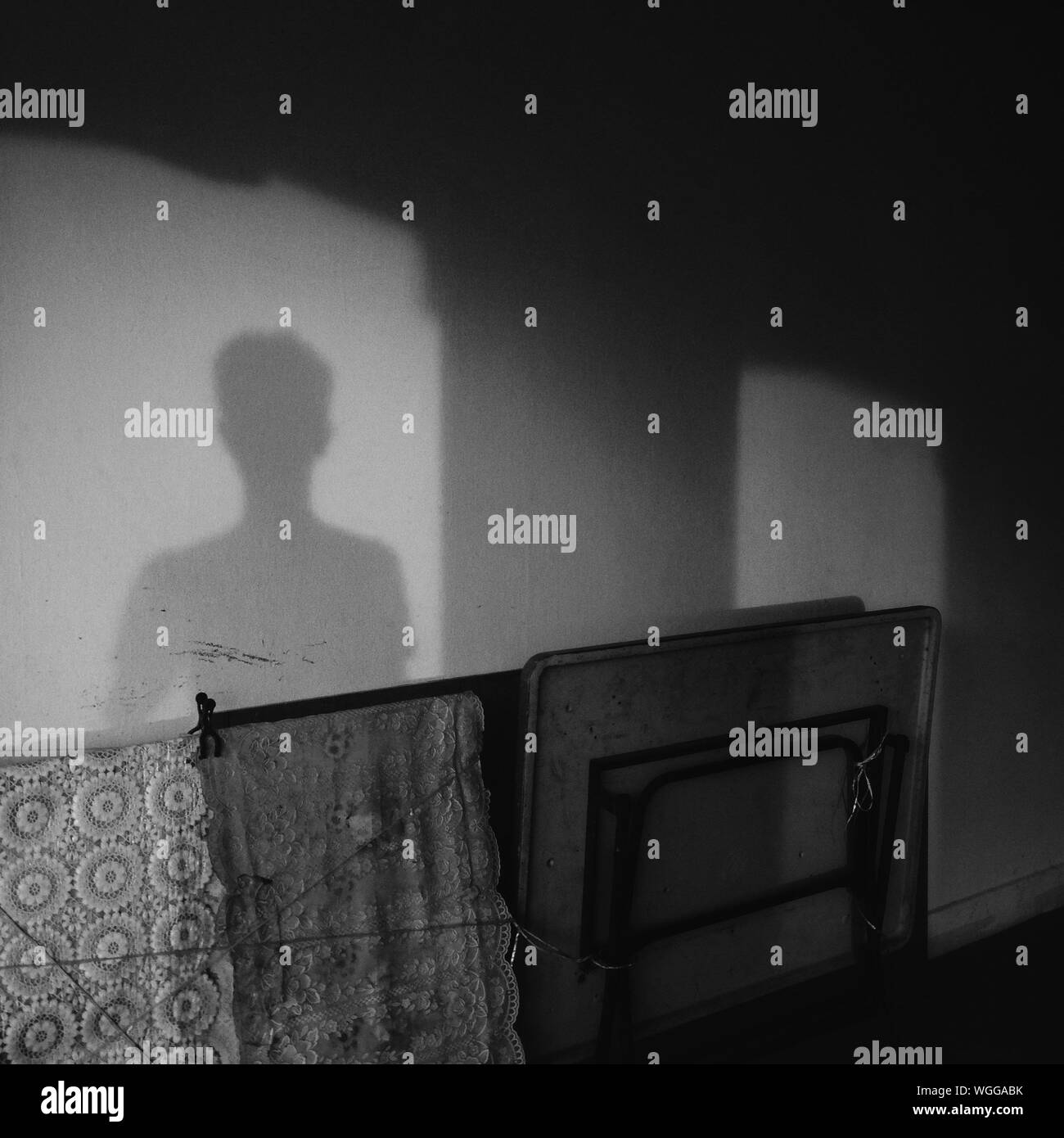 Man and shadow and room hi-res stock photography and images - Alamy