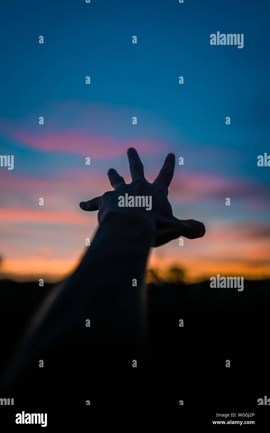 Hand Reaching To Sky High Resolution Stock Photography and Images - Alamy