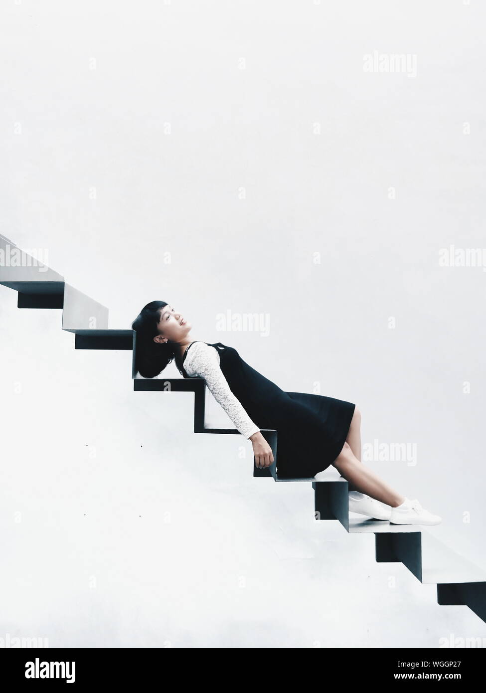 Woman steps studio hi-res stock photography and images - Alamy