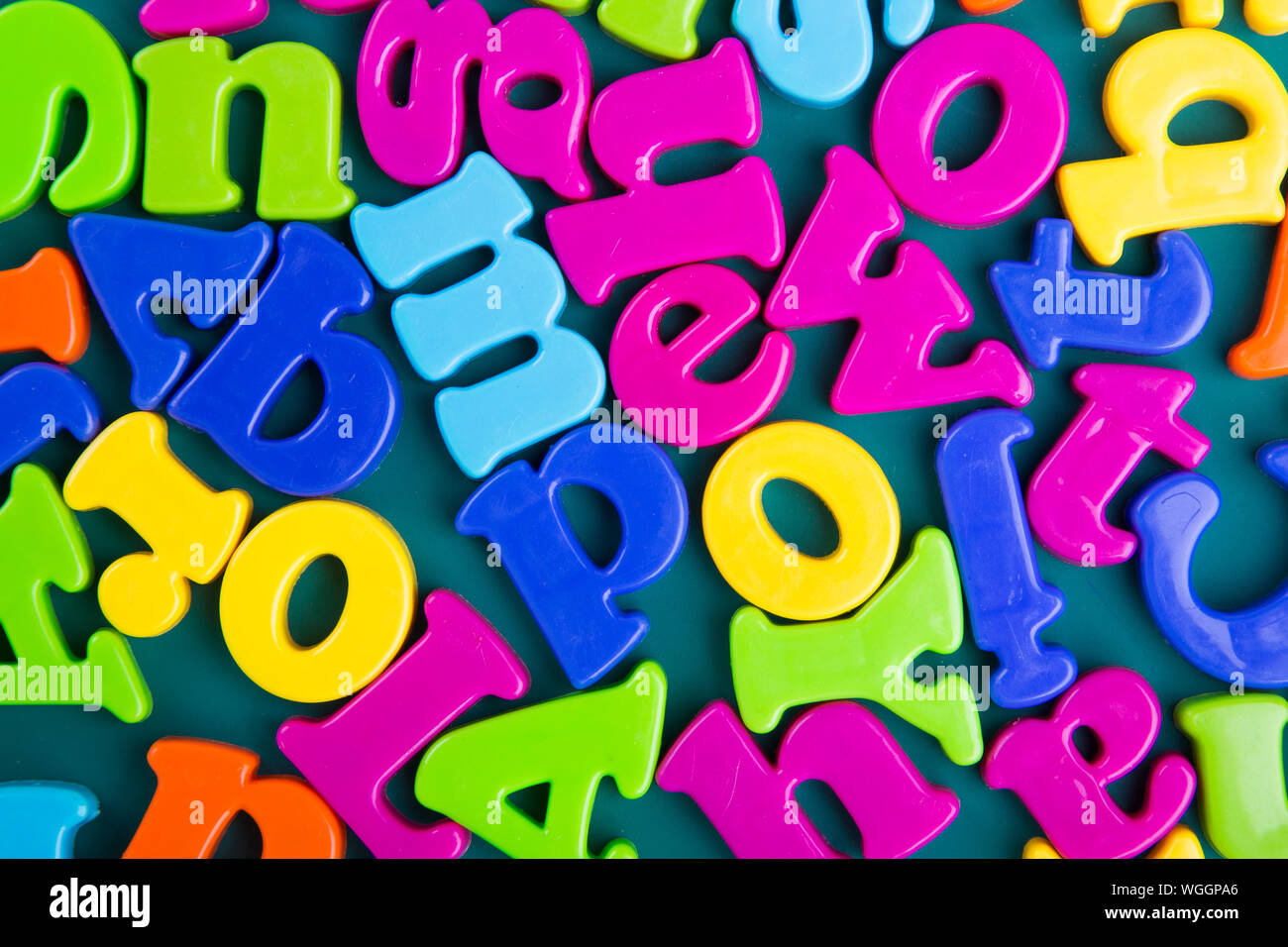 Colorful plastic alphabets hi-res stock photography and images - Alamy
